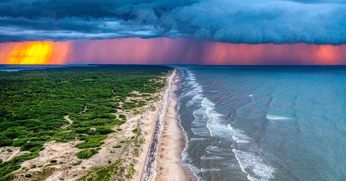 A Stormy Sunset Over North Carolina's Outer Banks is Captured in ...