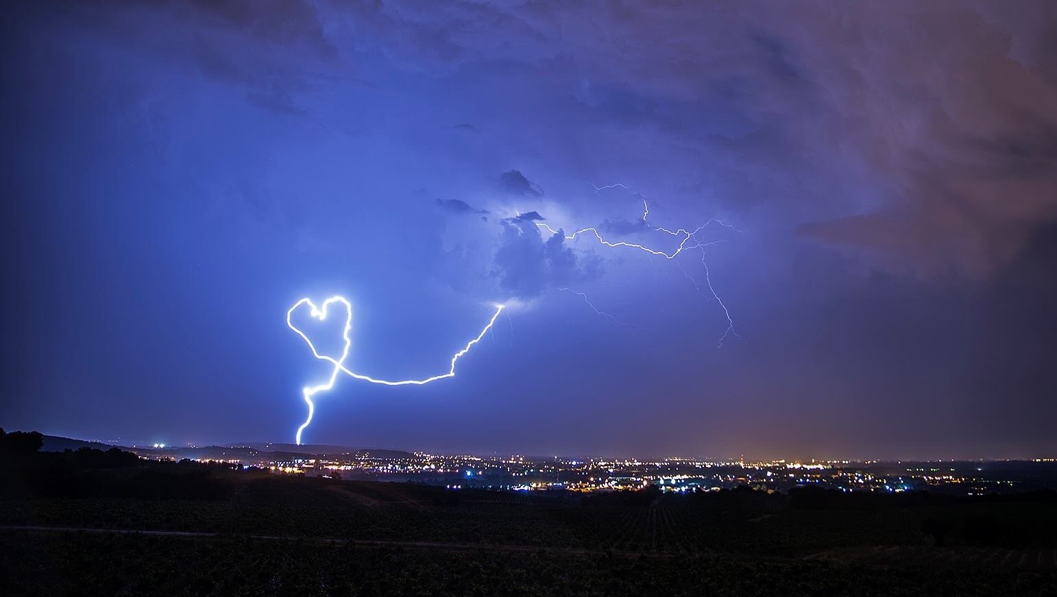 Capturing Romance in the Skies: The Heart-Shaped Lightning Strike by ...