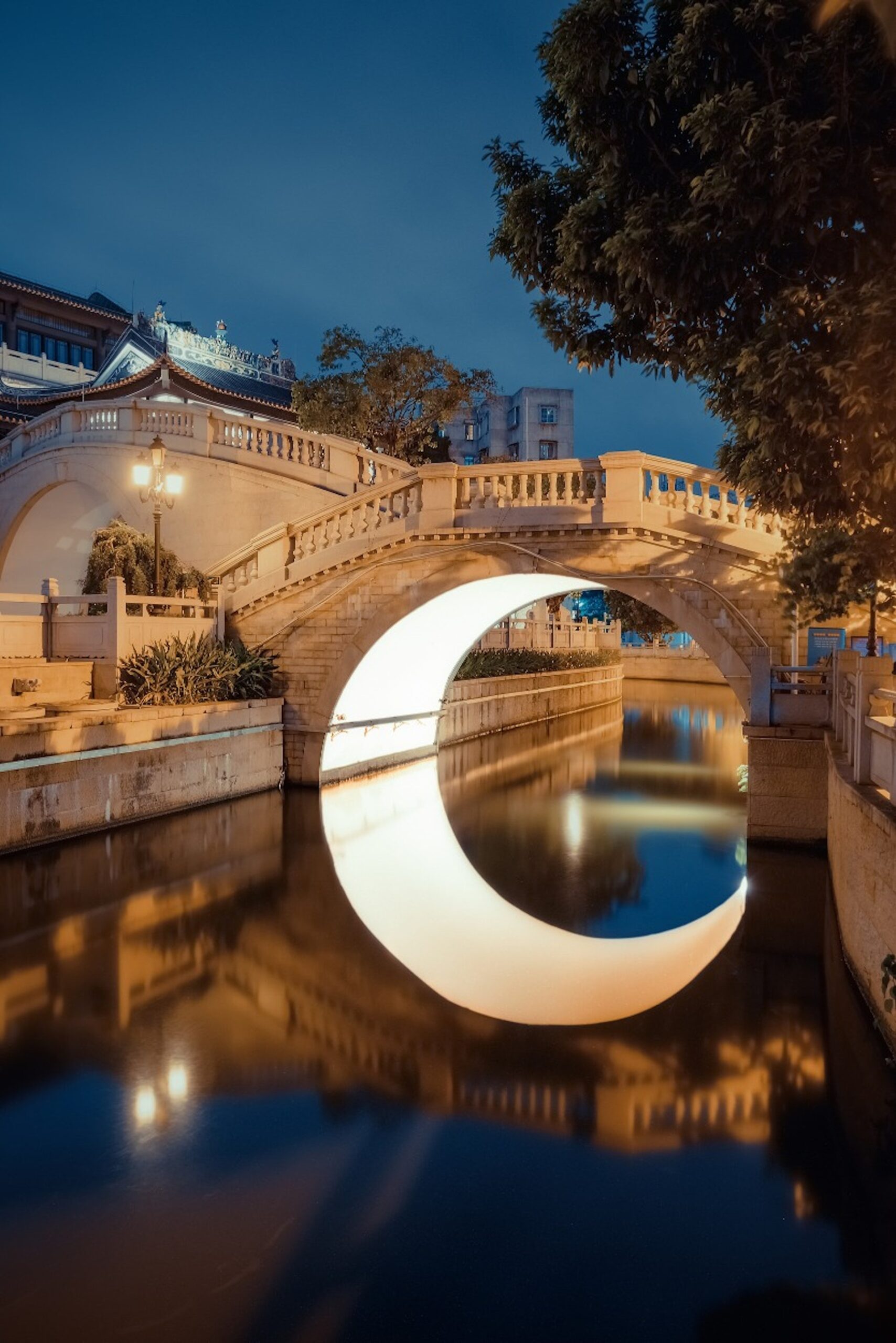 Exploring the Enchanting Crescent Moon Bridge in Yongqing Fang ...