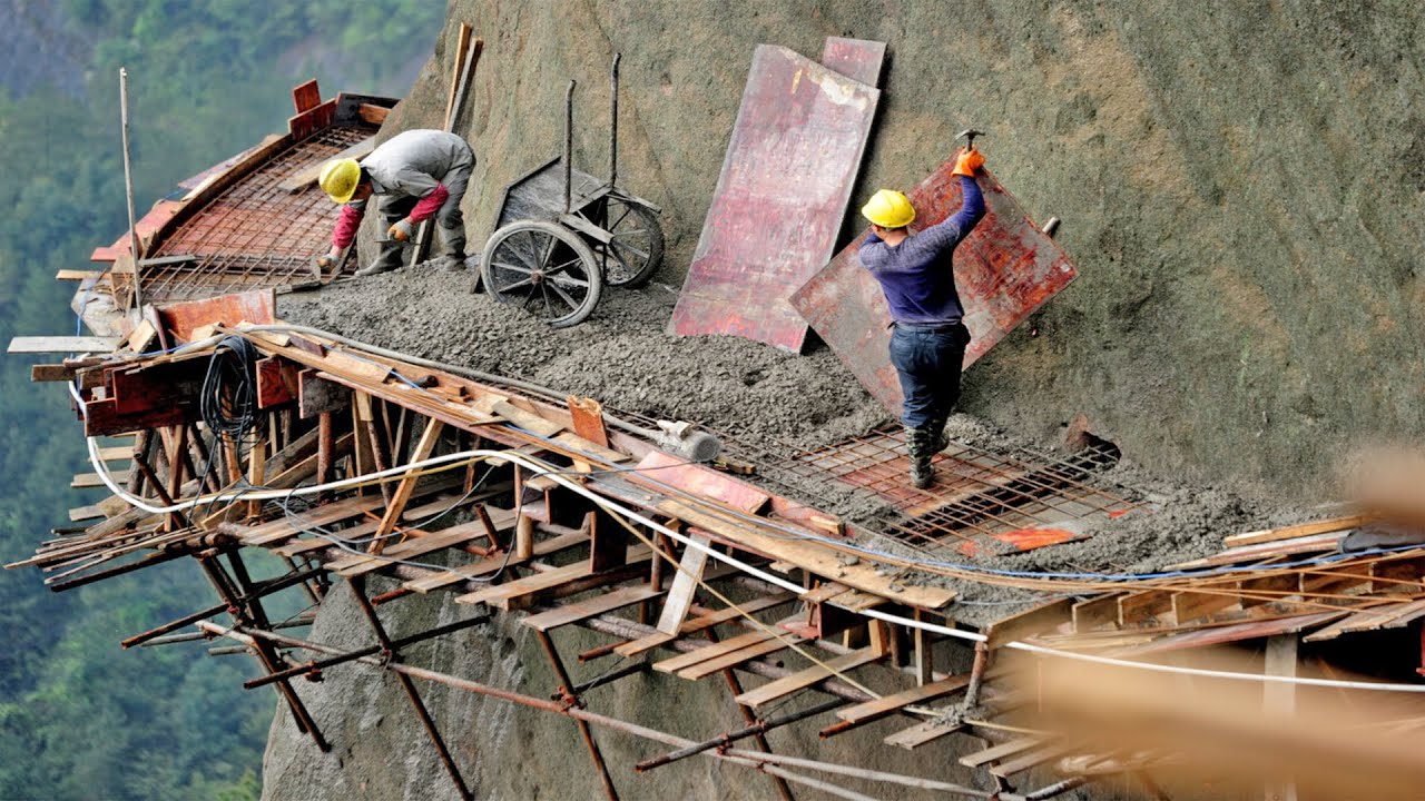 Fearless Chinese Workers Brave Perilous Cliff to Build Spectacular ...